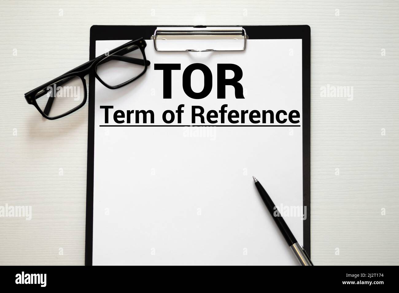 TOR. Terms Of Reference acronym on book. Office desk background Stock ...