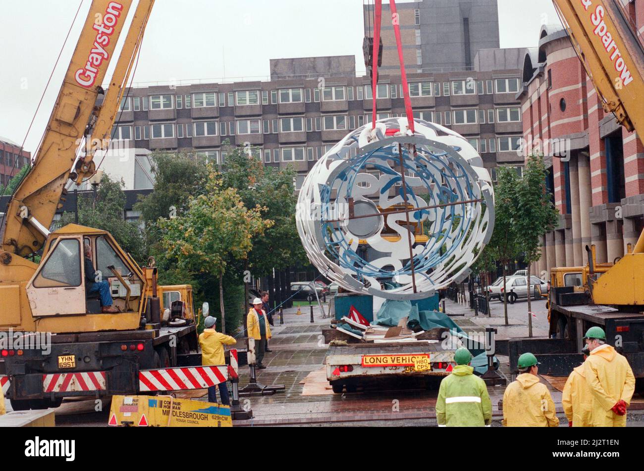 The sculpture 'Bottle of Notes' is lifted off its low loader in the ...