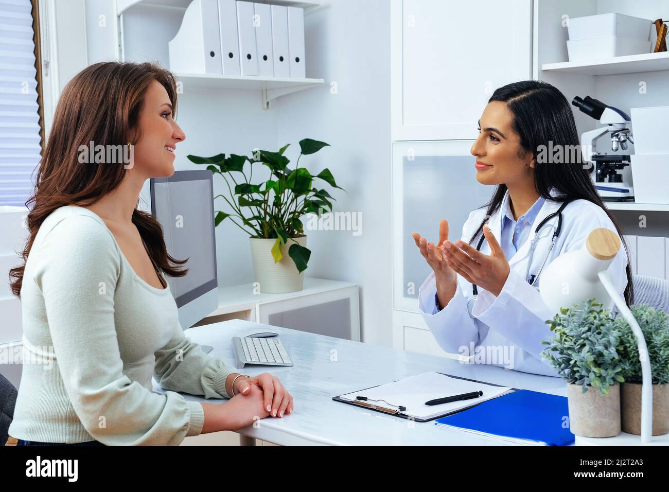 Lady client patient listening to detailed recommendations of qualified ...