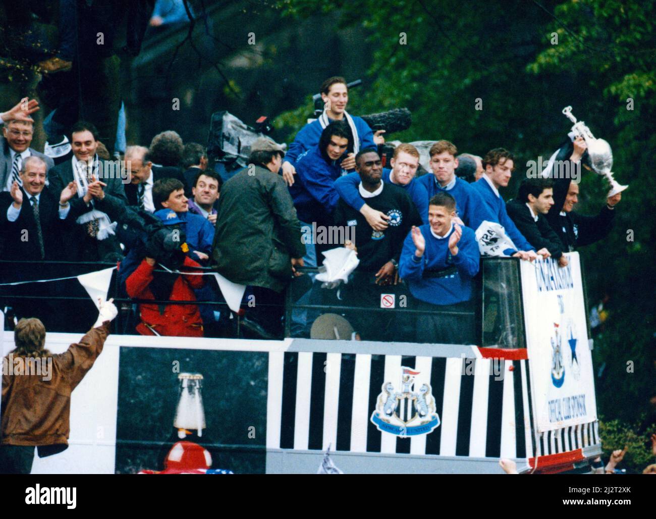 Newcastle United win the First Division. Players on the open top bus ...