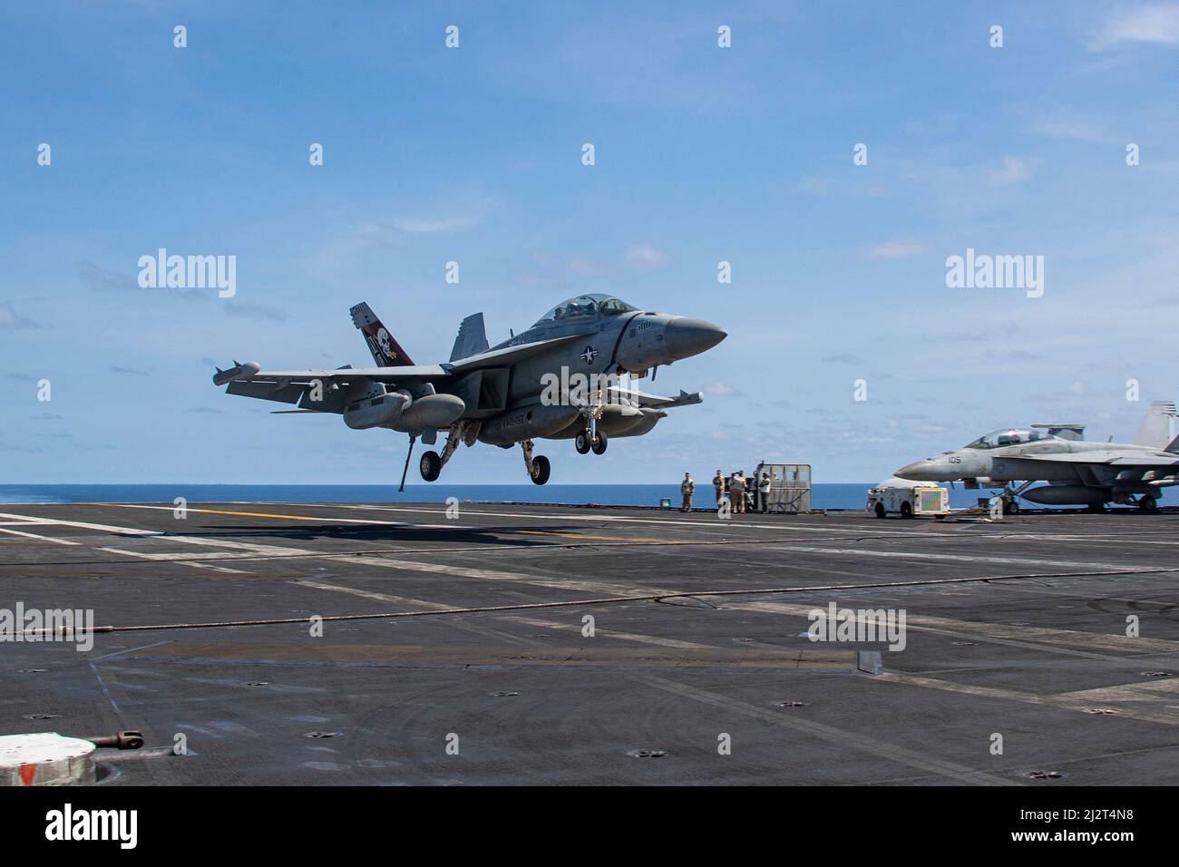 SOUTH CHINA SEA (April 1, 2022) Capt. Lewis Callaway, incoming ...