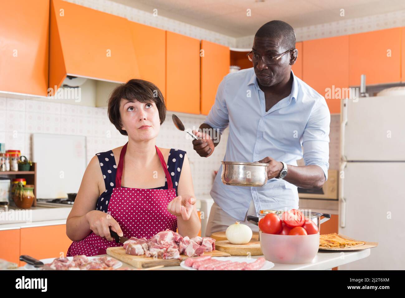 Woman cooking tired hi-res stock photography and images - Alamy