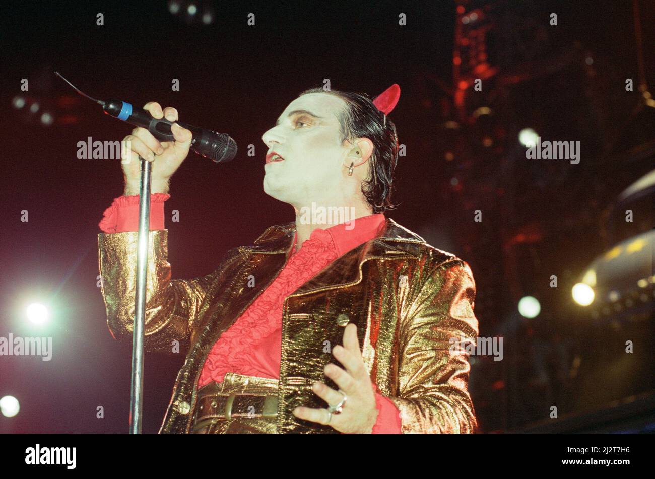 U2 in concert on the Zoo TV Tour, Wembley Stadium. Bono performing on ...