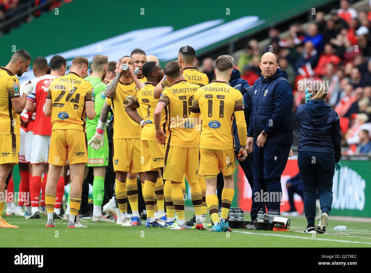 Matt Gray manager of Sutton United gives instructions during a drinks ...