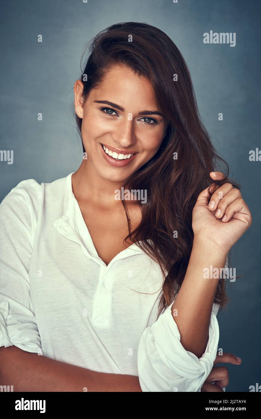 Beautiful inside and out. Portrait of a beautiful young woman smiling ...