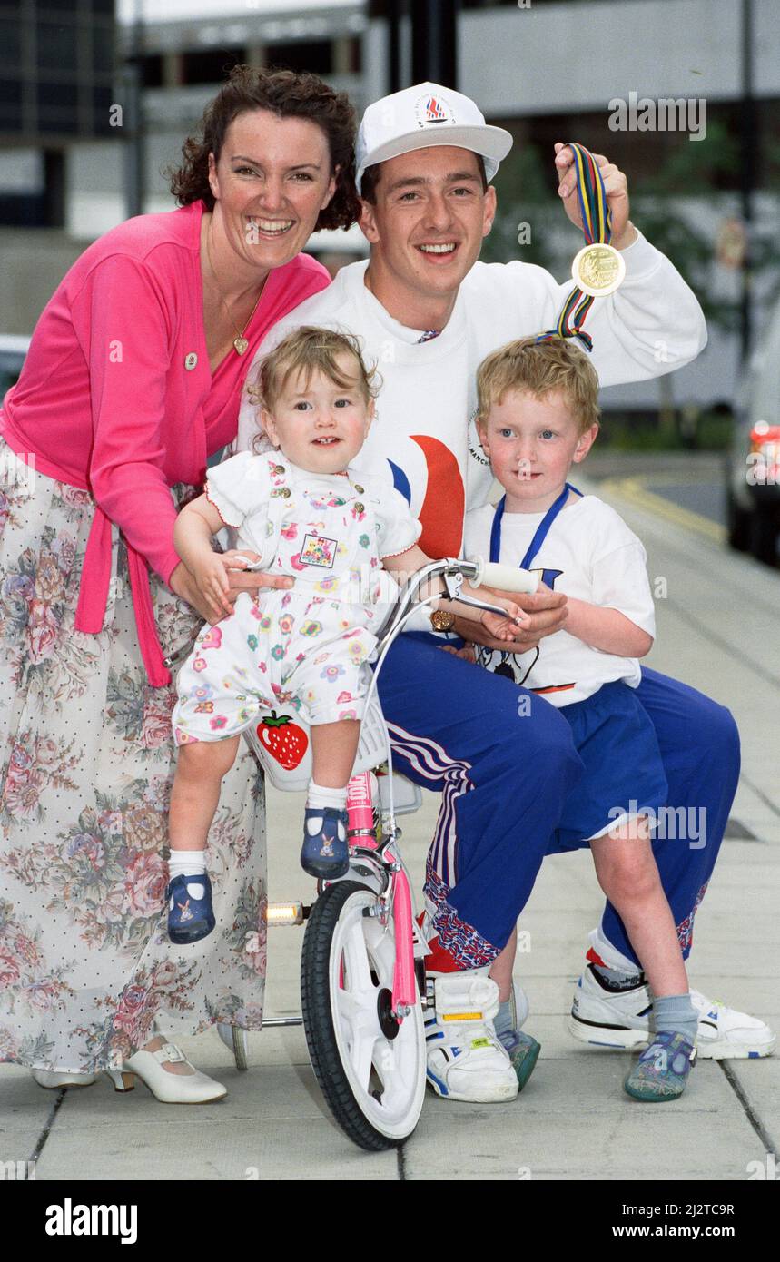 British cyclist Chris Boardman poses with his family on arrival at ...