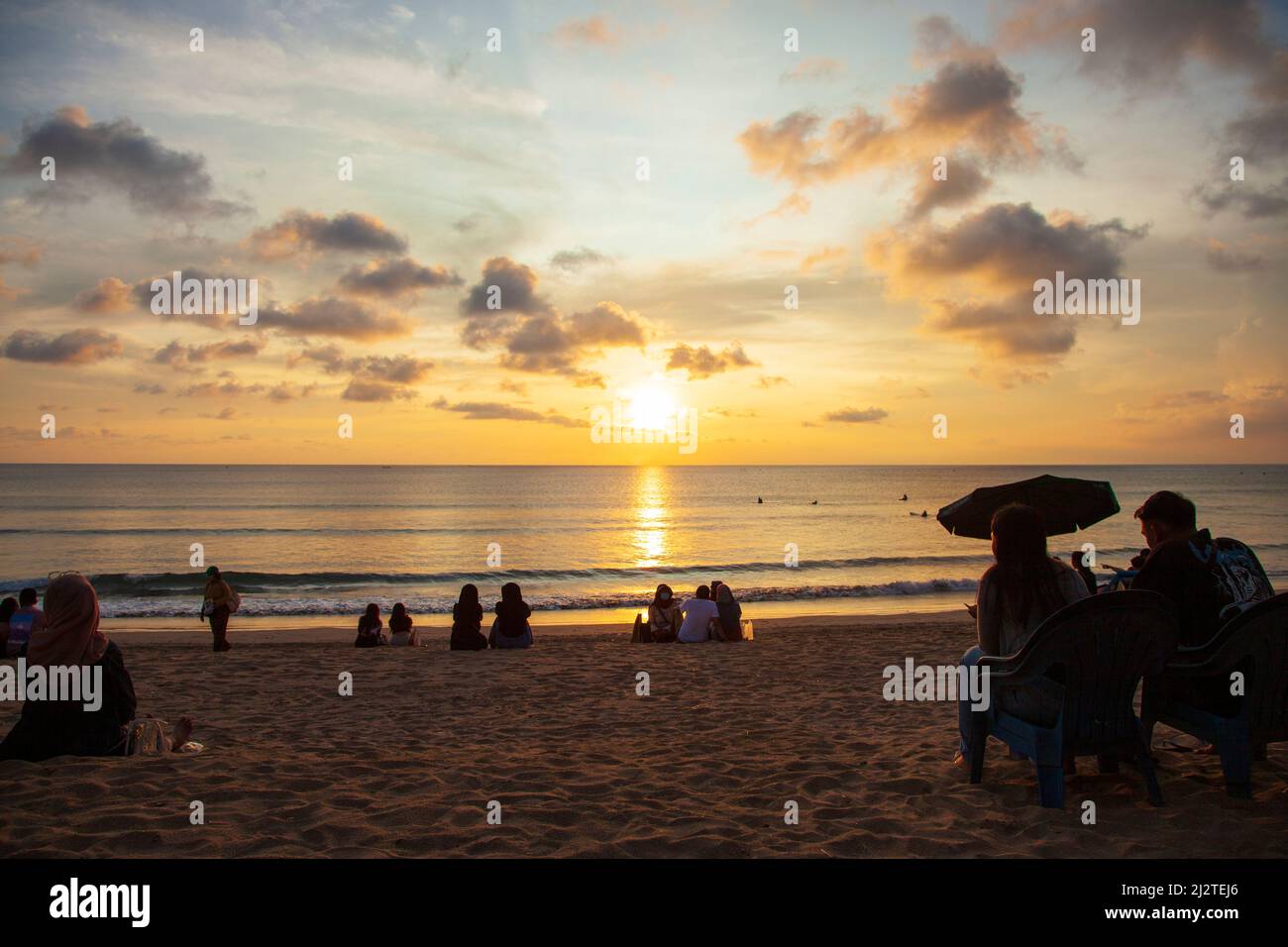 Sunset at Kuta Beach in Kuta, Bali, Indonesia Stock Photo - Alamy