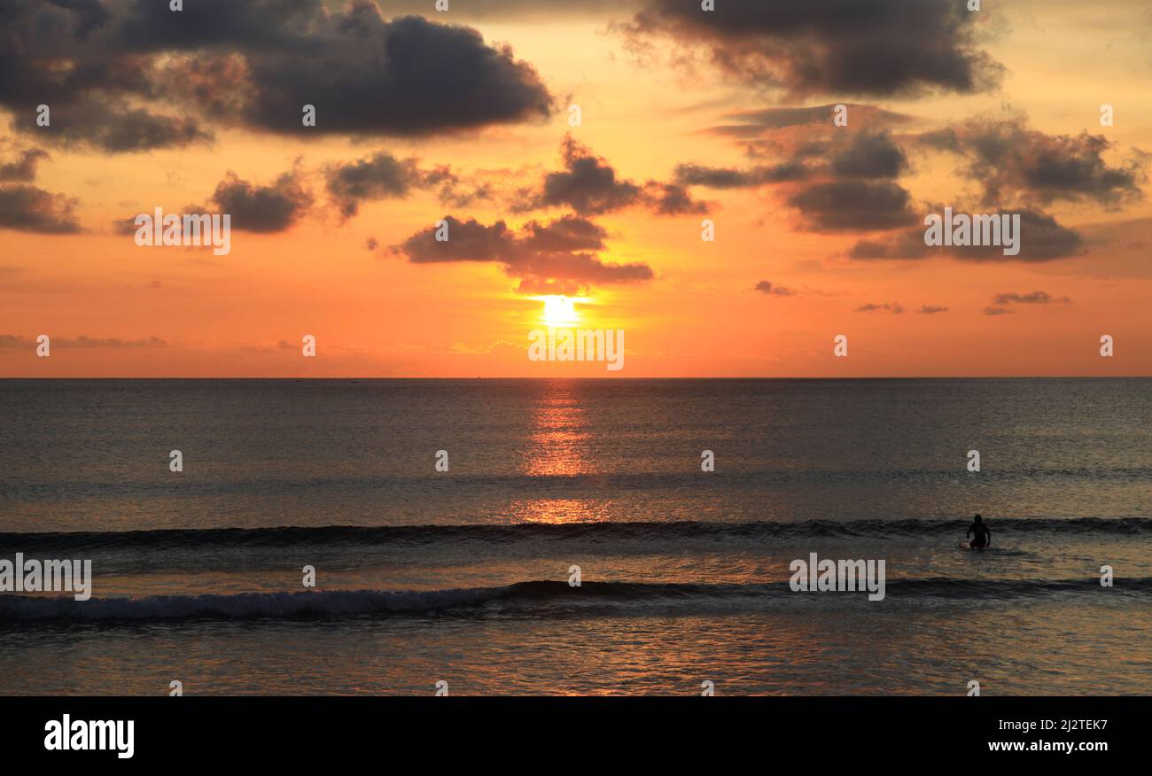 Sunset at Kuta Beach in Kuta, Bali, Indonesia Stock Photo - Alamy