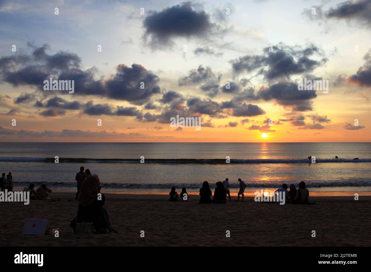 Sunset at Kuta Beach in Kuta, Bali, Indonesia Stock Photo - Alamy