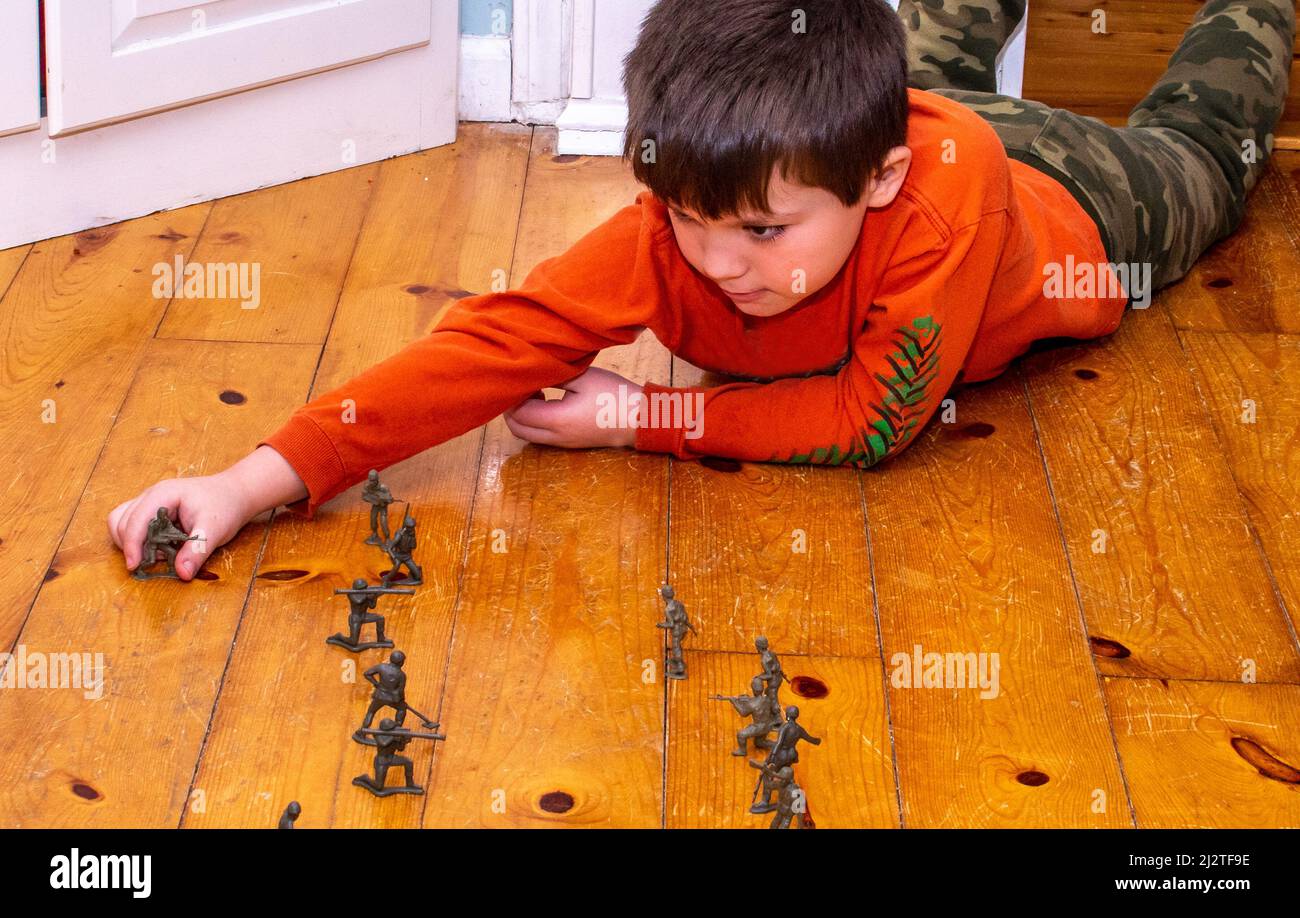 Boy playing soldiers hi-res stock photography and images - Alamy