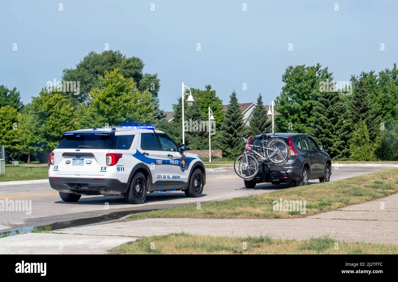 June 19 2021 St Joe MI USA; a police pulls over a vehicle for some ...