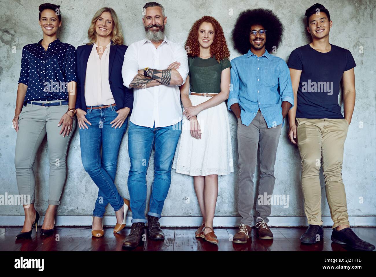 Were in line to our next big success. Portrait of a group of designers ...