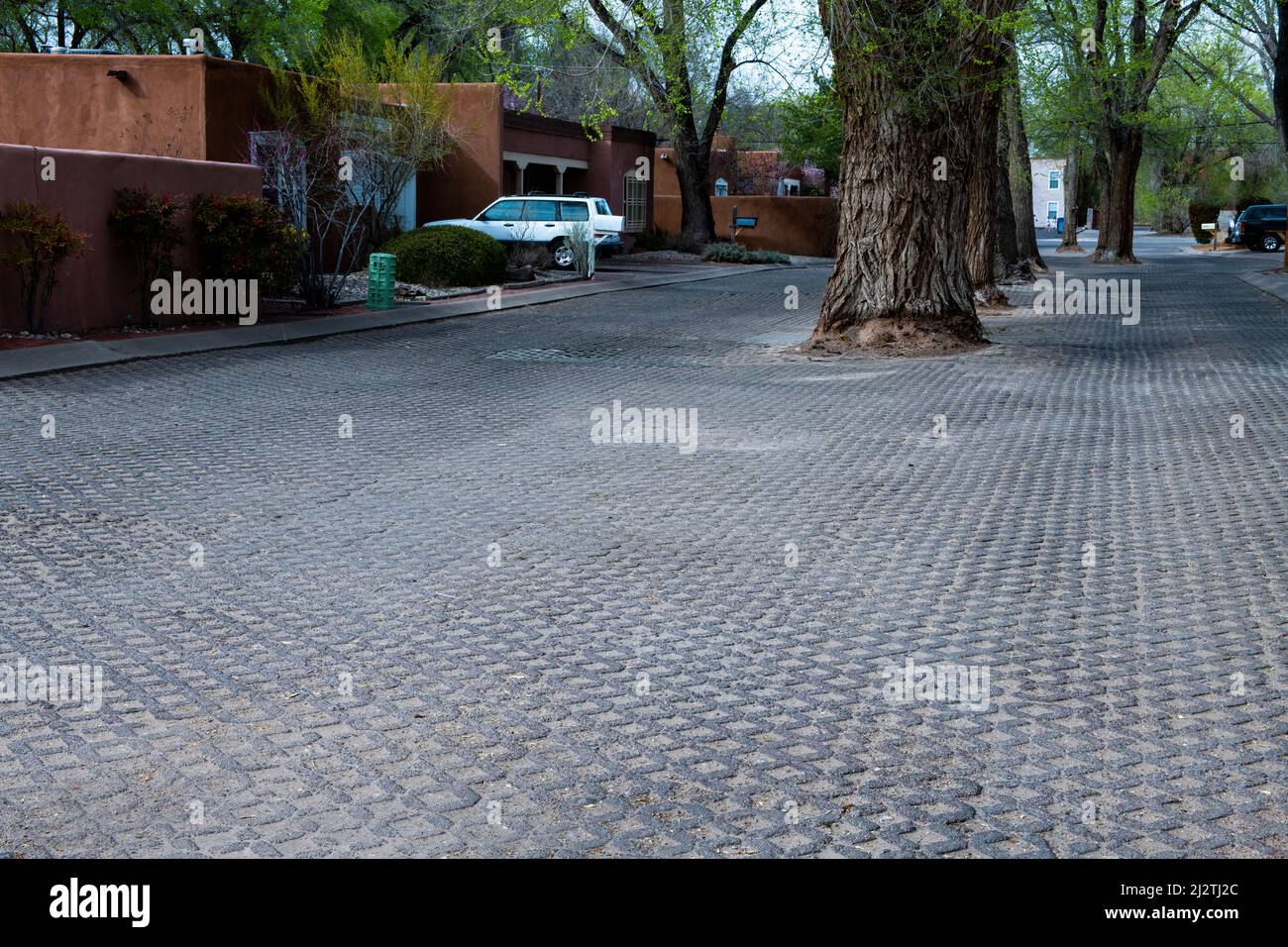 Permeable pavement on a residential city street allows stormwater ...