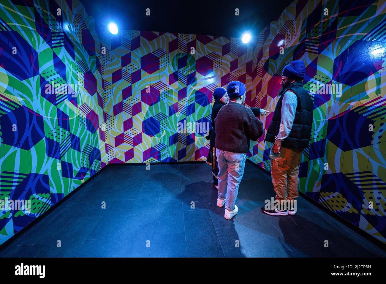 Toronto, Canada. 02nd Apr, 2022. A family poses for a photo inside of a ...