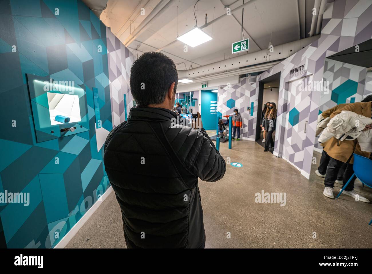 Toronto, Canada. 02nd Apr, 2022. A man takes a photo of a perspective ...