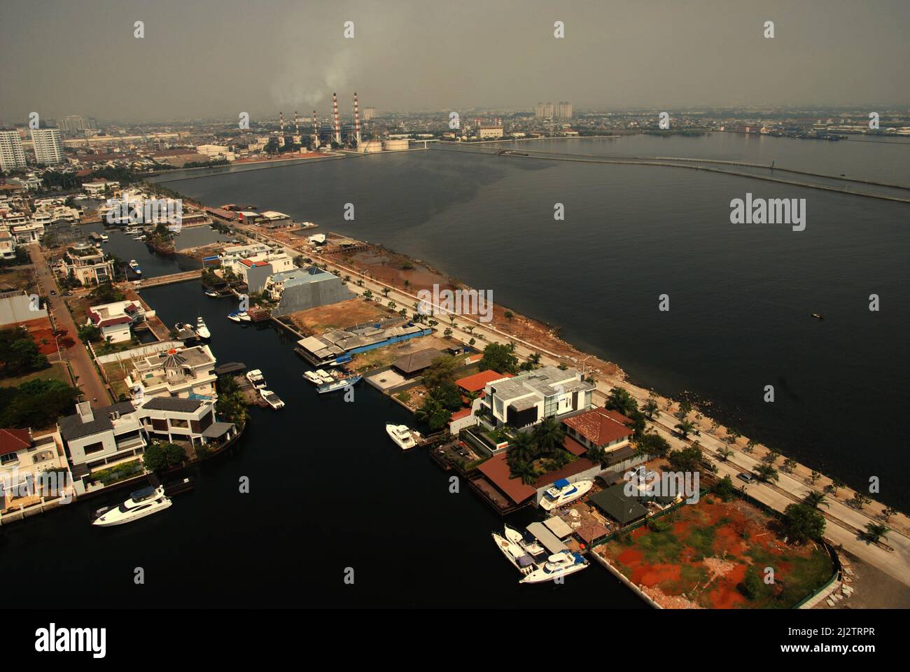 Aerial view of Jakarta coastal area from the seafront residential ...