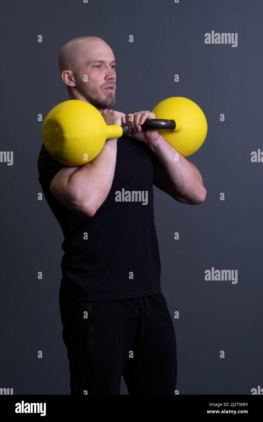 Guy with a yellow kettlebell gym anonymous young male, from motivation ...