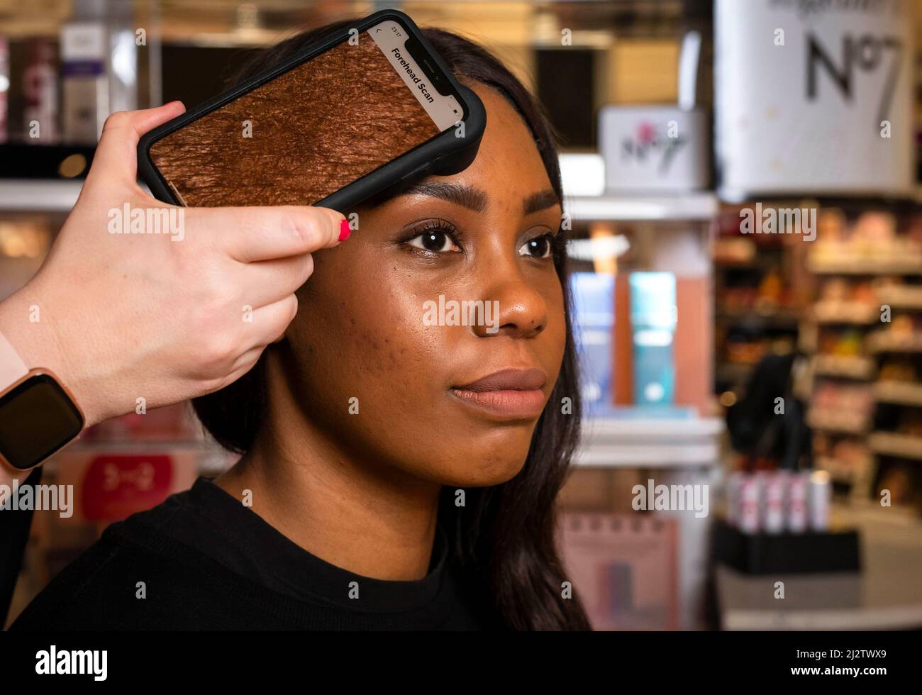 EDITORIAL USE ONLY Simone Yussuf uses the No7 Pro Derm Scan, a new free ...