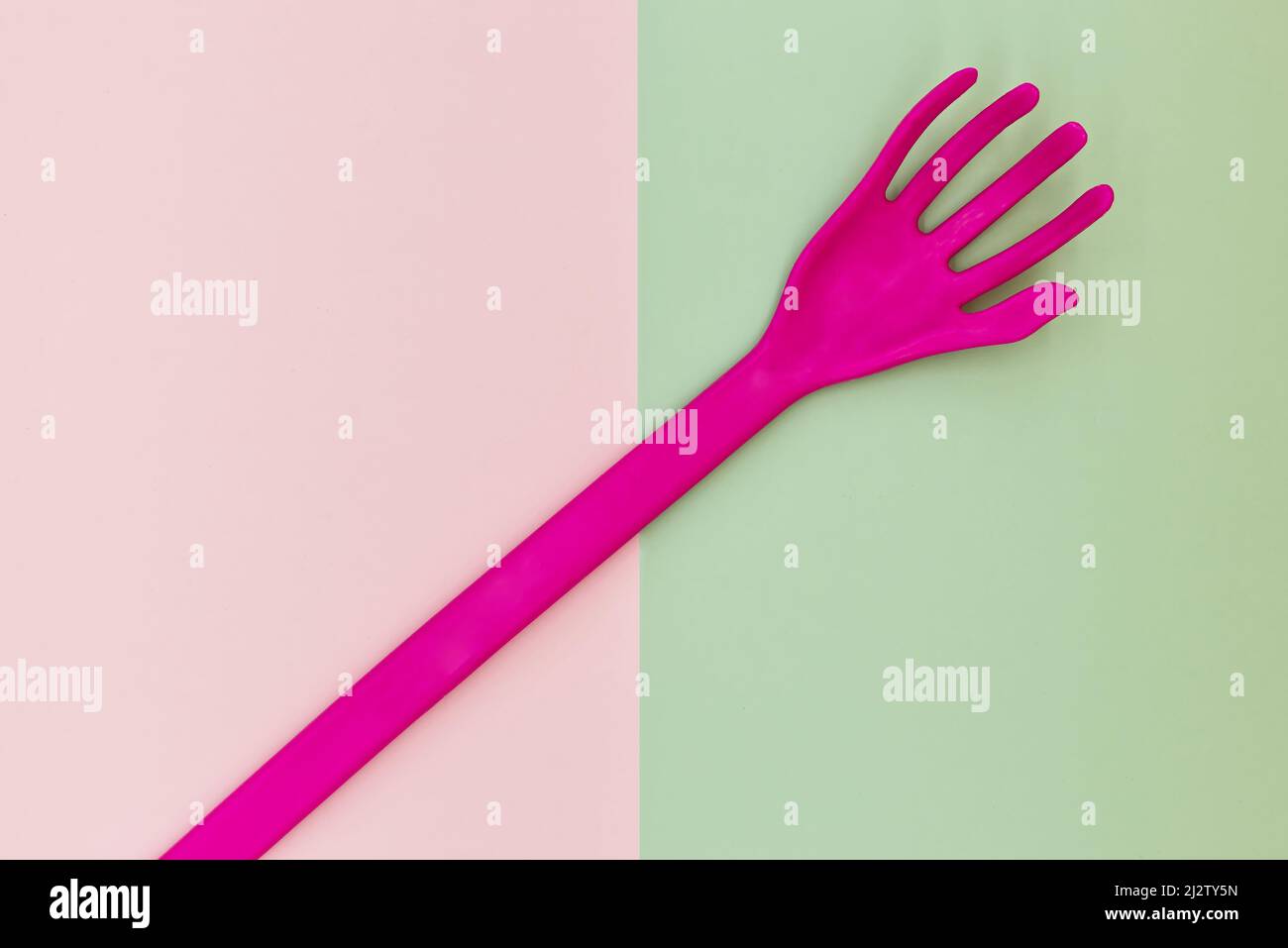 Stylized plastic hand isolated on palette color background Stock Photo ...