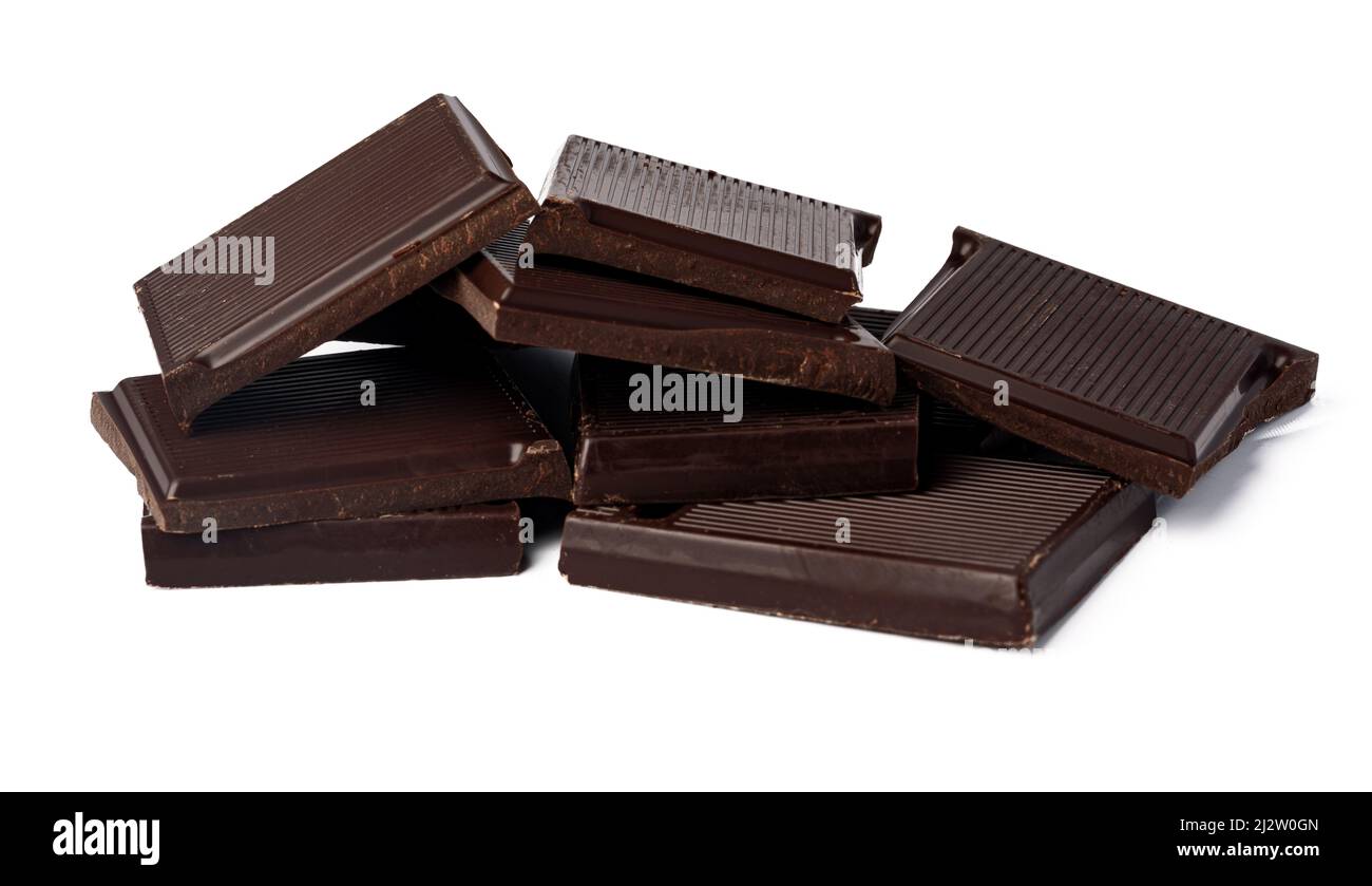Small dark chocolate pieces isolated on white background Stock Photo ...