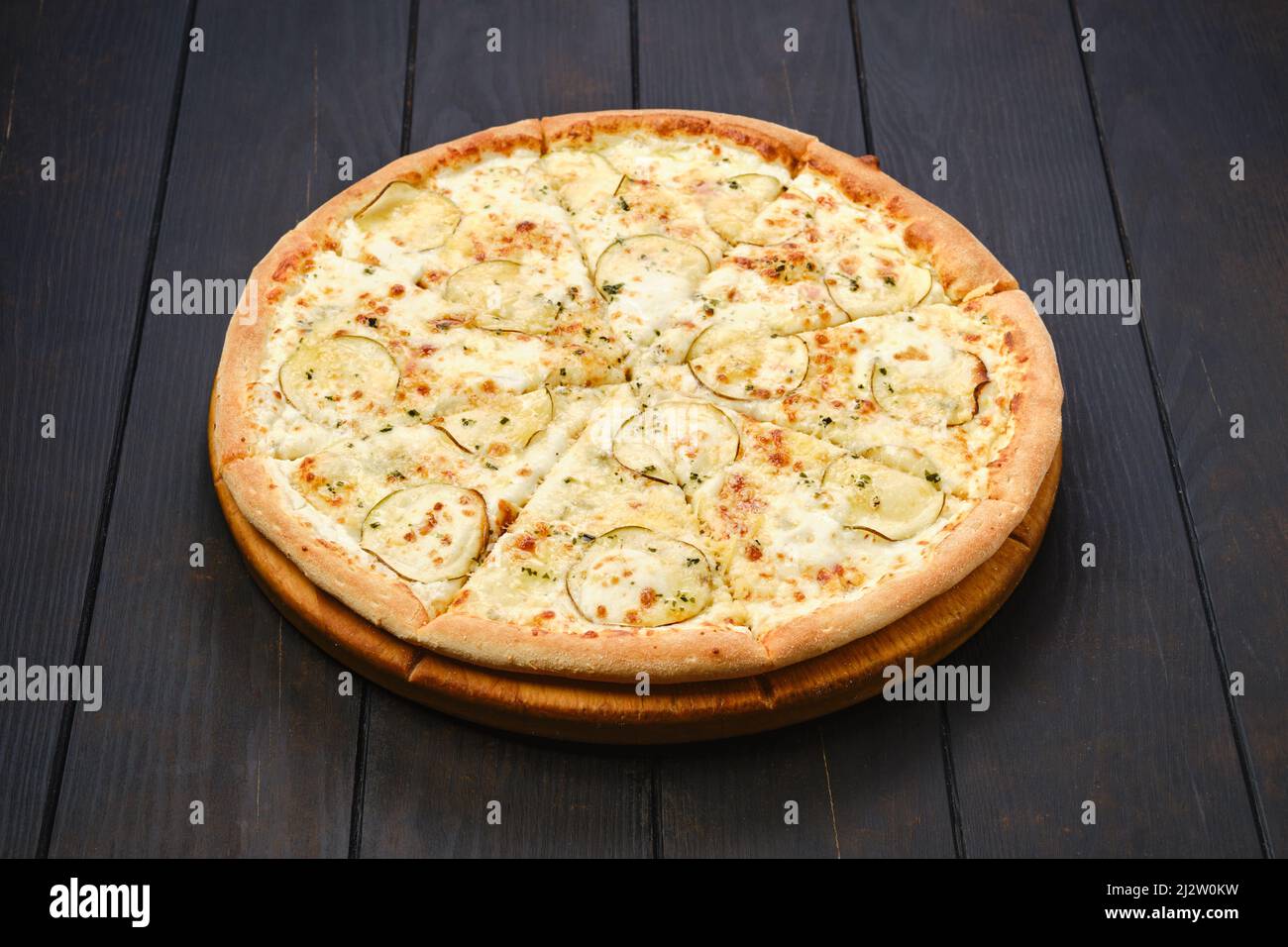 Classic pizza with dorblu cheese, pear and maple syrup Stock Photo - Alamy