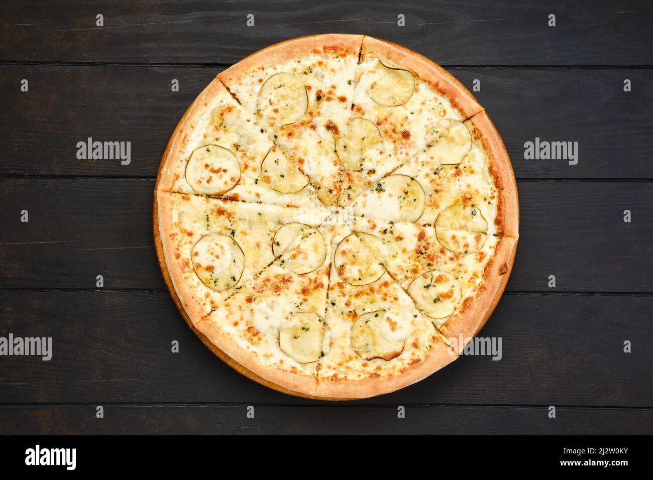 Classic pizza with dorblu cheese, pear and maple syrup, top view Stock ...