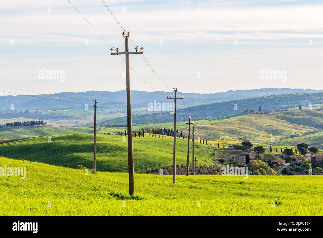 Power line in a rural Italian landscape Stock Photo - Alamy