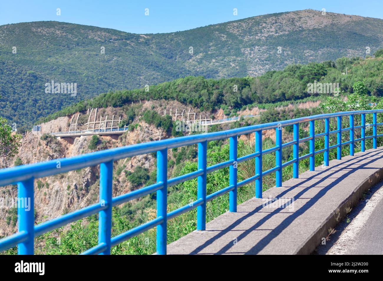 Mountain footbridge with balustrade . Pedestrian bridge in Balkans ...