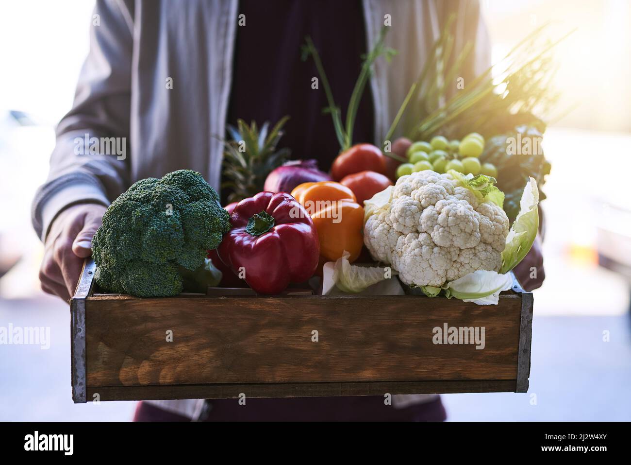 As fresh as if they were just picked. Cropped shot of a courier making ...