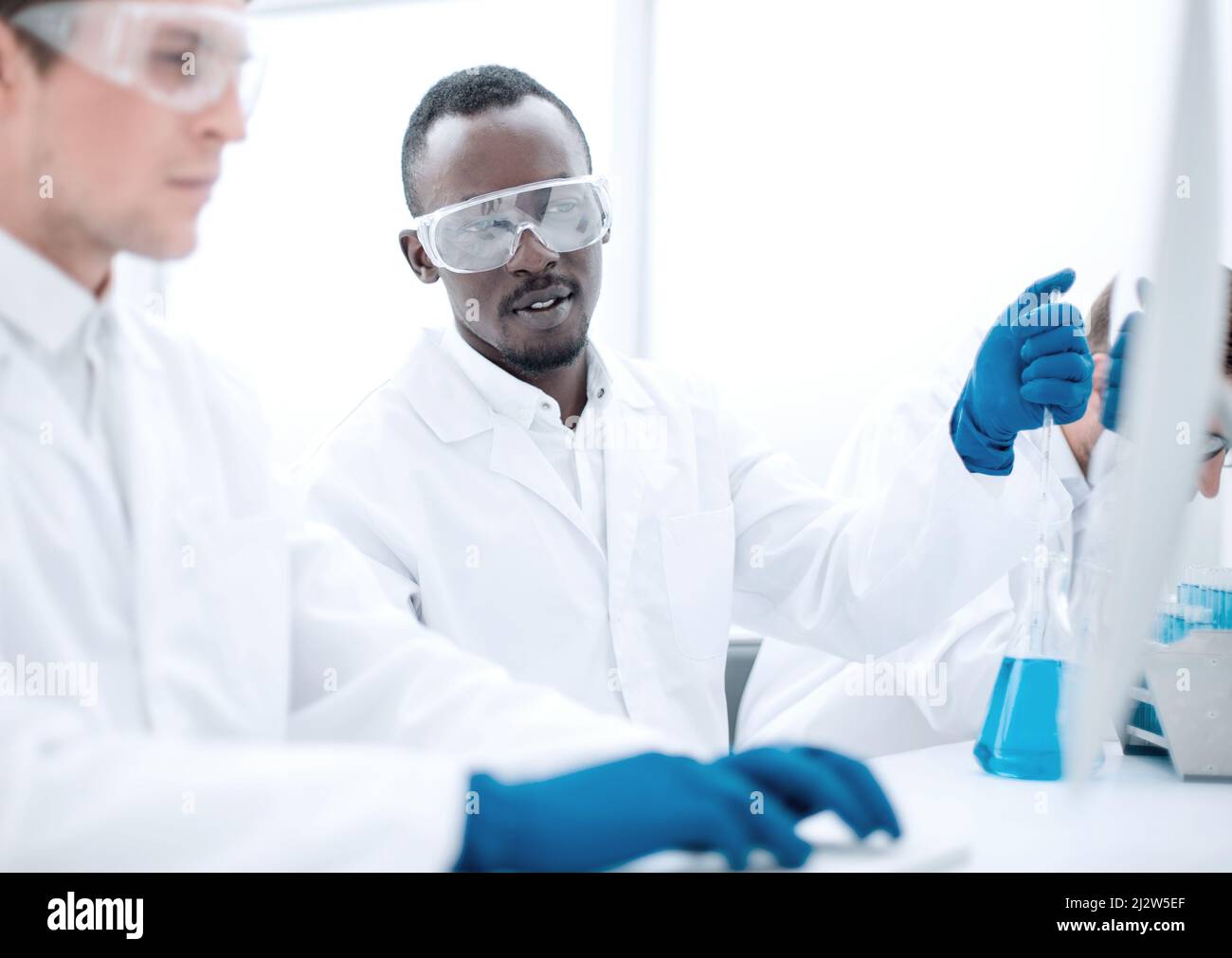 Scientists using modern computer technology hi-res stock photography ...