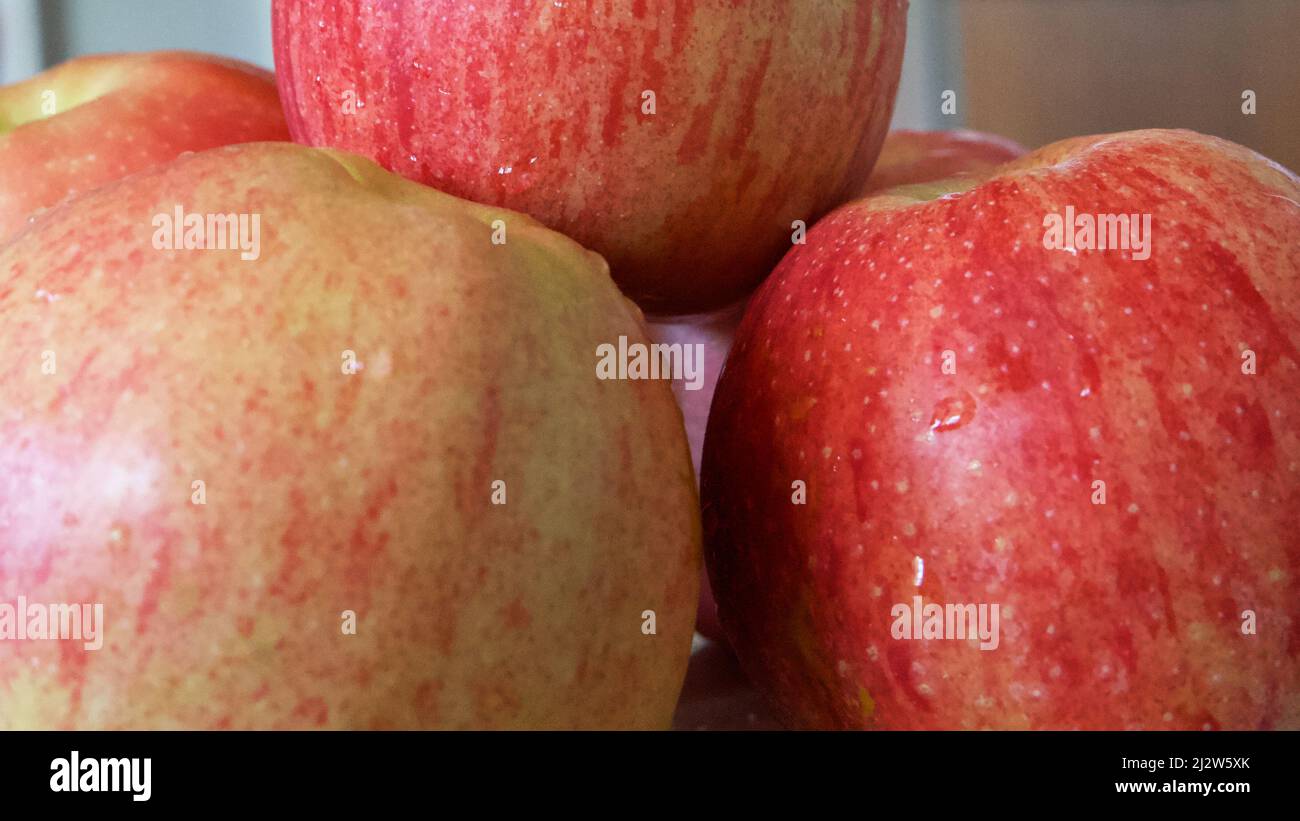Gala apples stacked in a pile. Ripe fruit close-up Stock Photo - Alamy