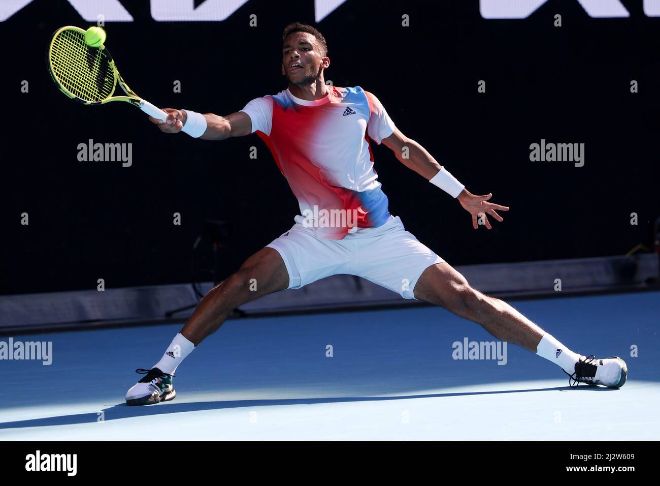 Canadian tennis player Felix Auger- Aliassime playing forehand shot at ...