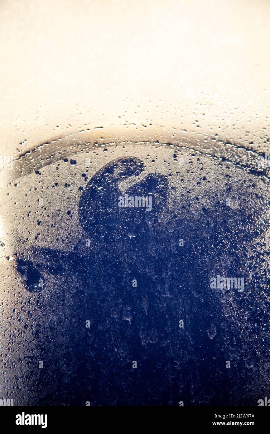 Eye Drawn on Wet Window Stock Photo - Alamy