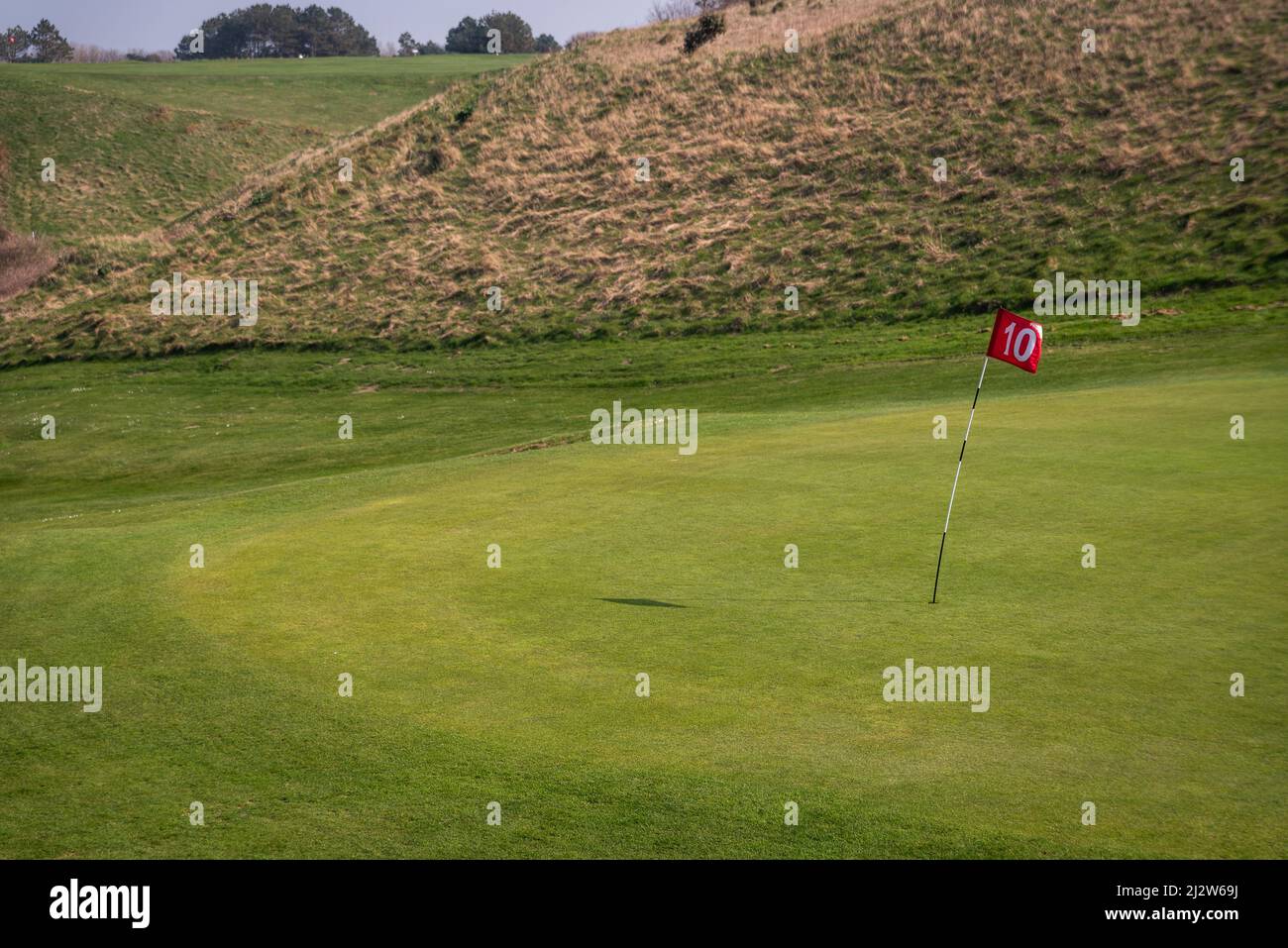 Golf course flag in hi-res stock photography and images - Alamy