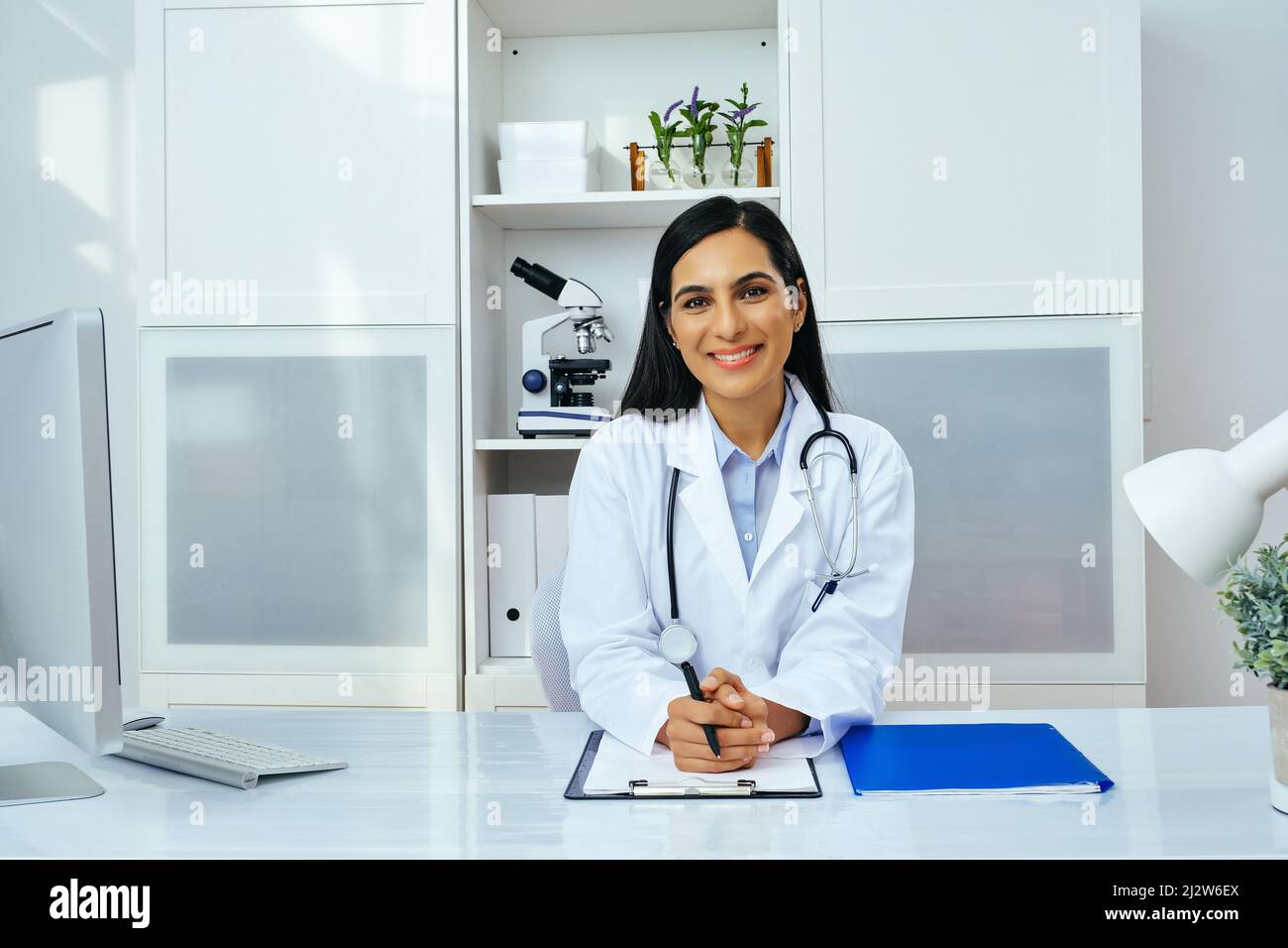 Beautiful young female doctor hi-res stock photography and images - Alamy