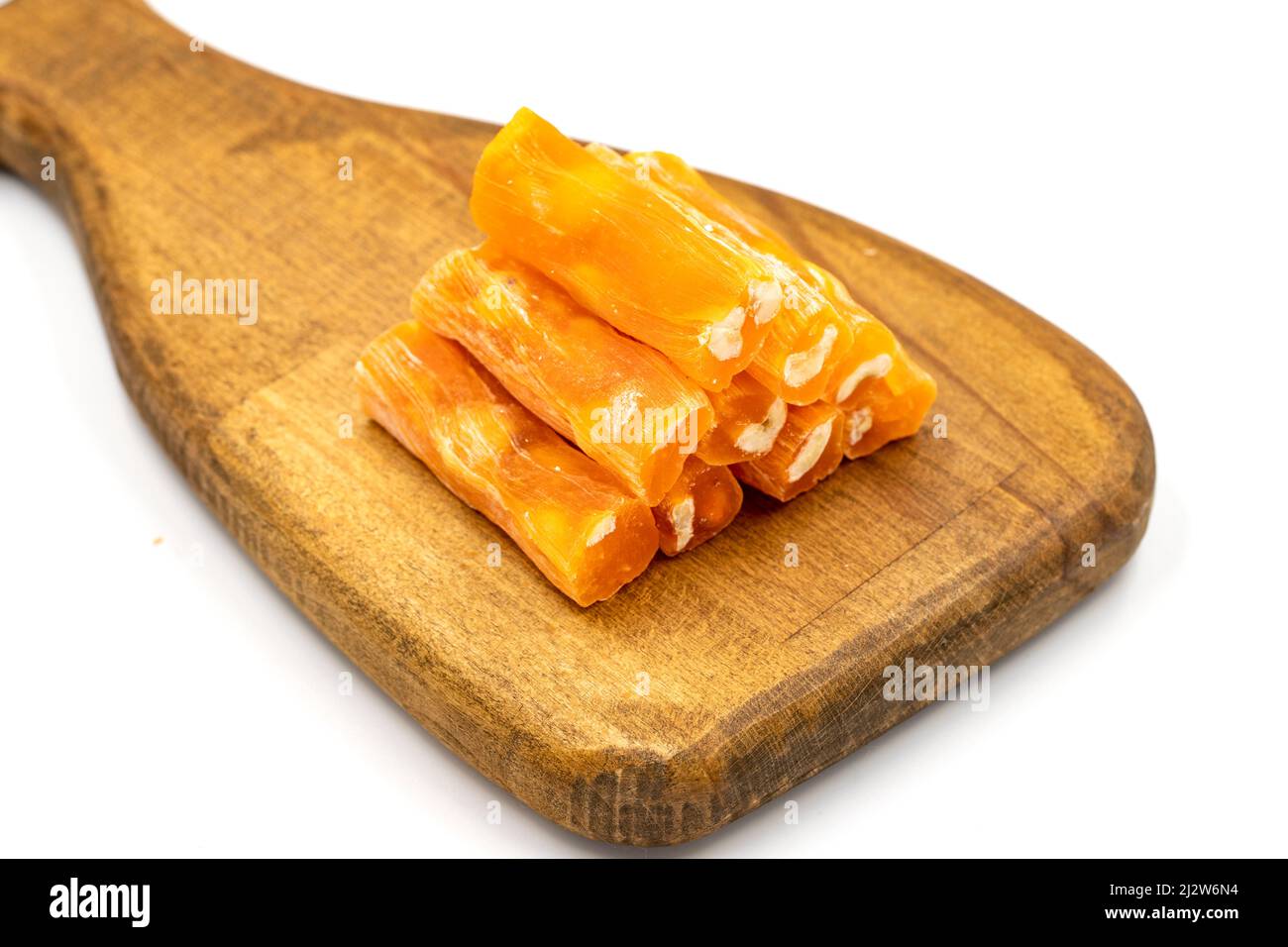 Turkish Delight Orange Fingers with Hazelnuts isolated on a white ...