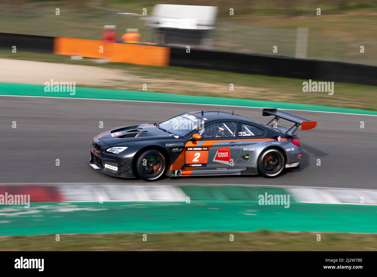 Spectacular BMW M6 GT race in action on asphalt track blurred motion ...