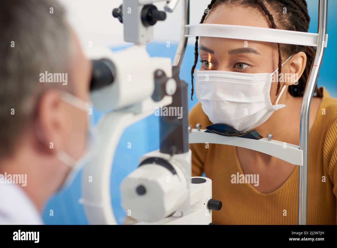 African woman examined by doctor hi-res stock photography and images ...