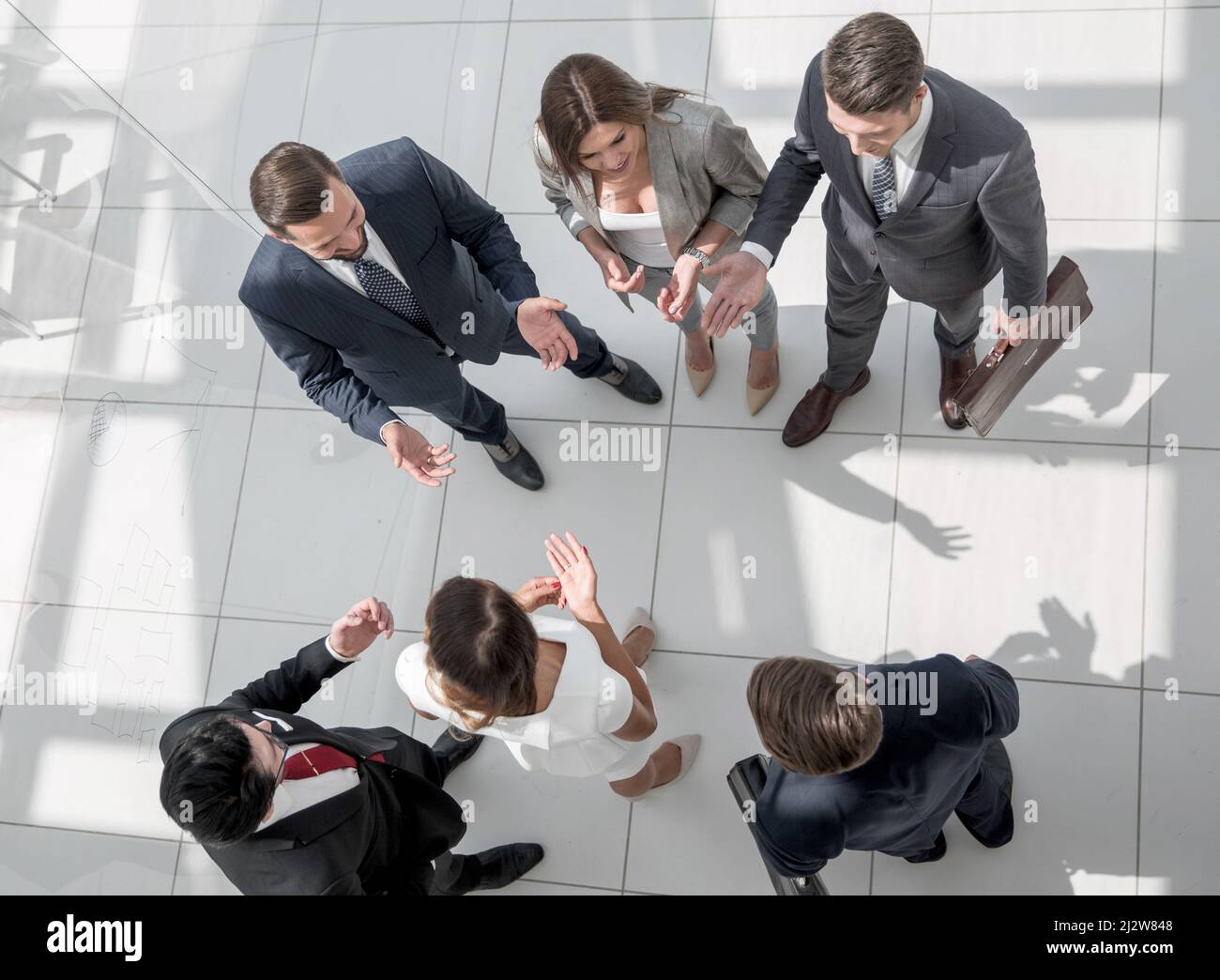 top view. employees discussing important issue Stock Photo - Alamy