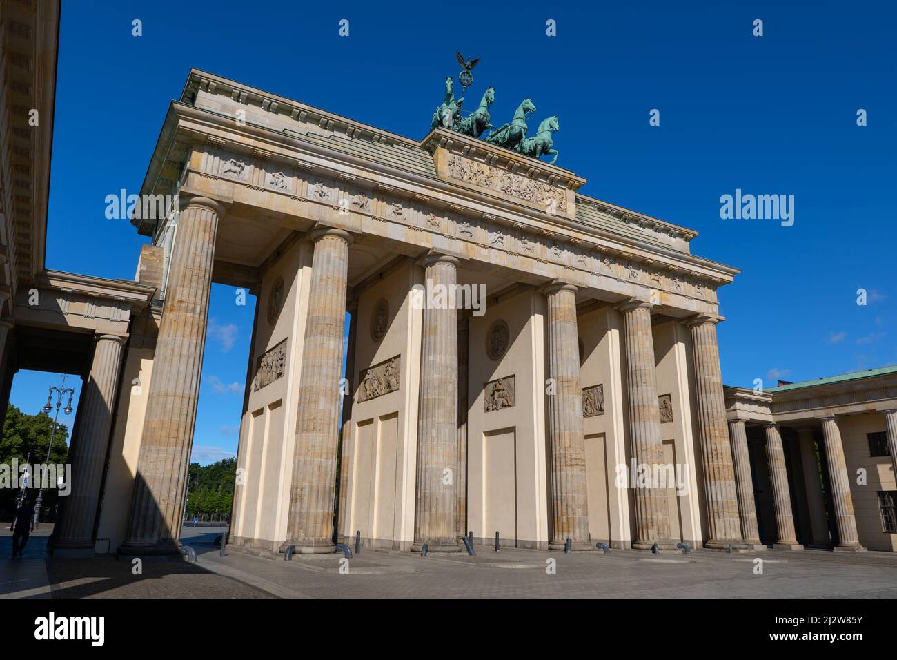The Brandenburg Gate in city of Berlin in Germany. Neoclassical style ...