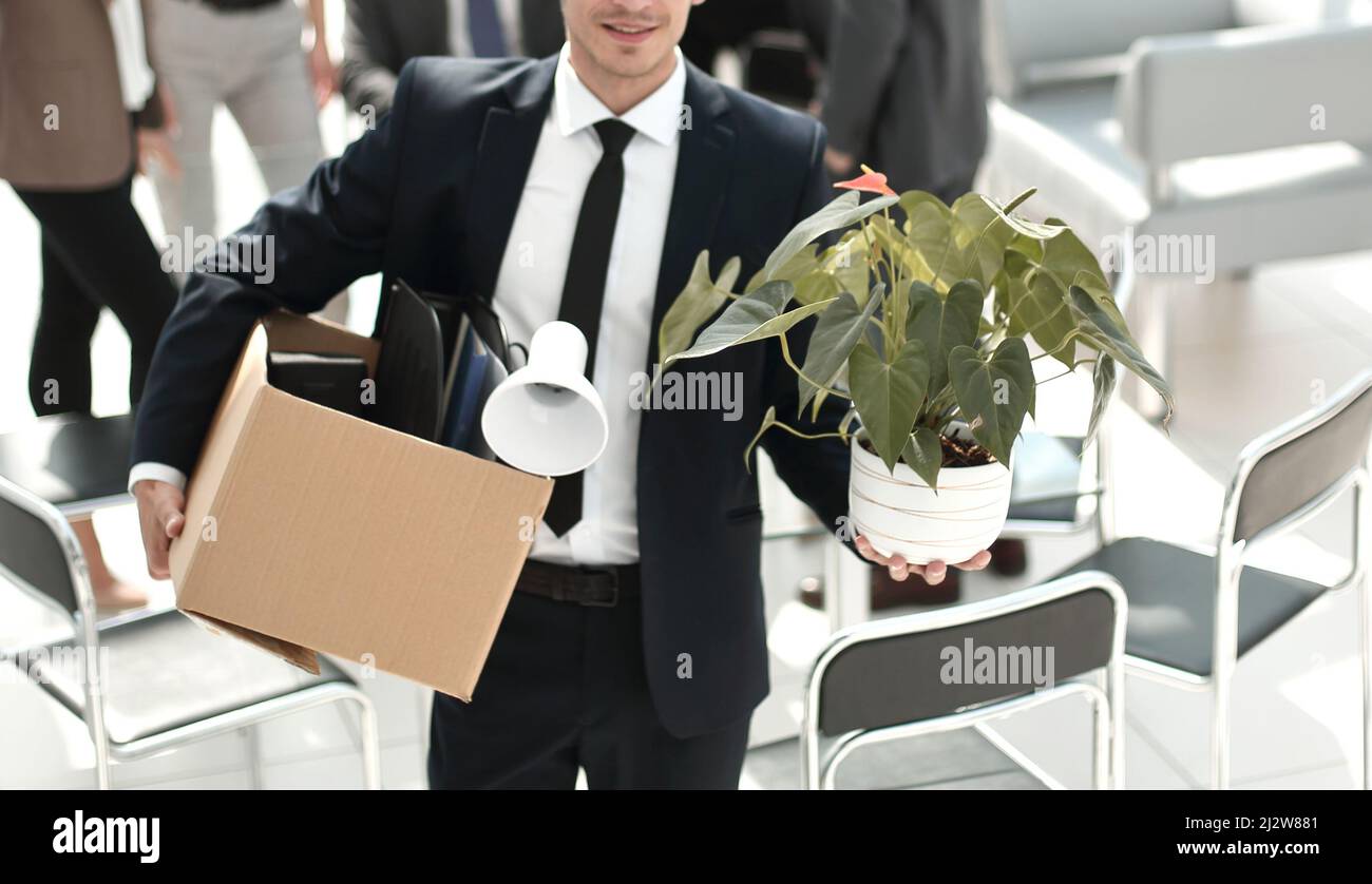 young employee standing in office on his first day Stock Photo - Alamy