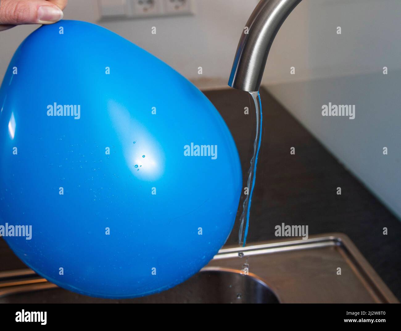 Static Electricity Balloon And Water