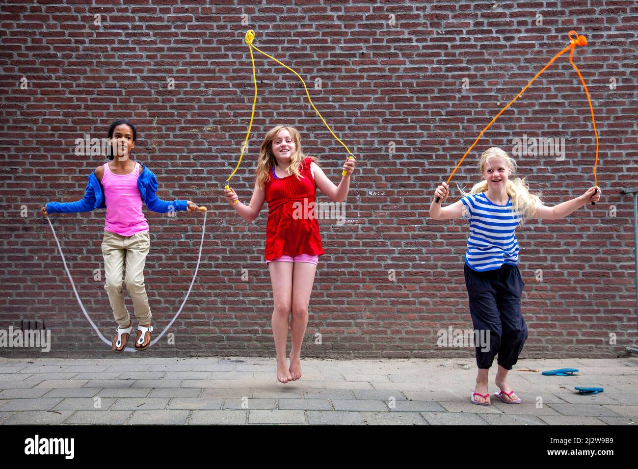 Children feet rope hi-res stock photography and images - Alamy
