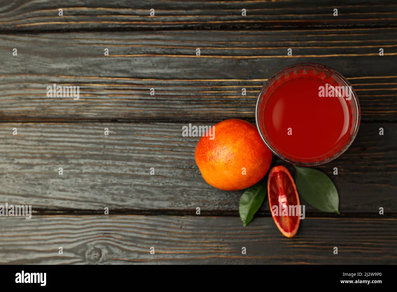 Concept of fresh drink with red orange juice Stock Photo - Alamy