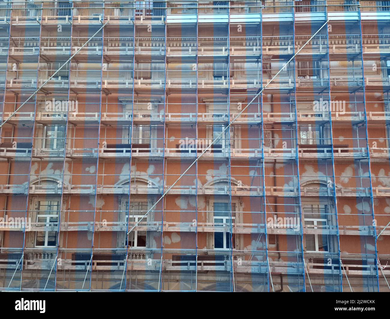scoffolding building renovation in bologna italy Stock Photo - Alamy