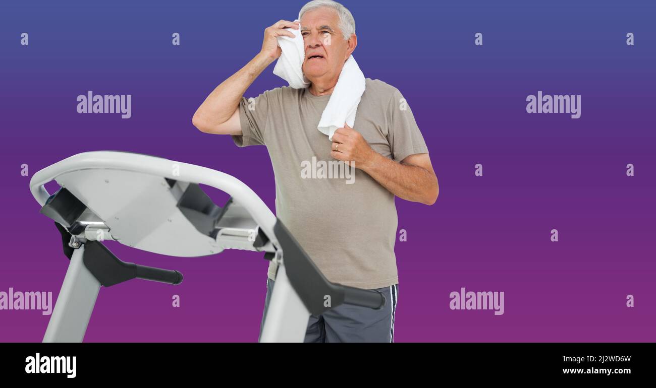 Senior man walking on treadmill hi-res stock photography and images - Alamy
