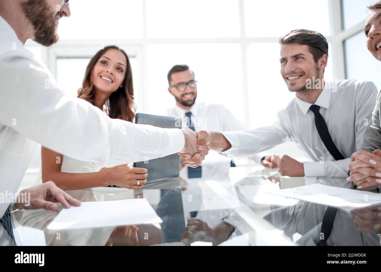 handshake of reliable partners in the office Stock Photo - Alamy