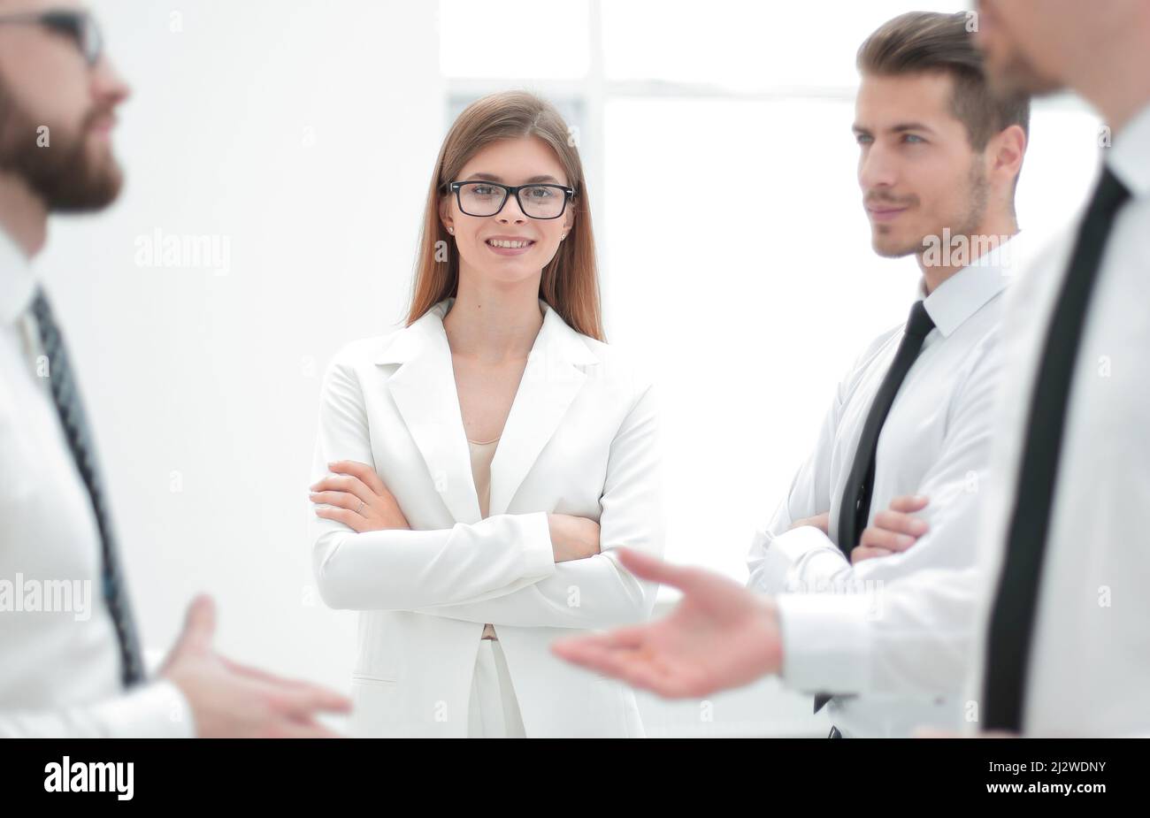 Female boss speaking group employees hi-res stock photography and ...