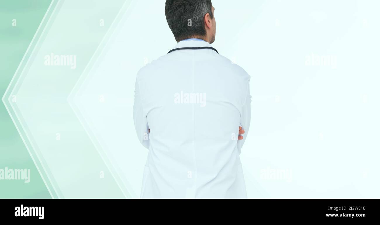 Composition of rear view of male doctor in lab coat and stethoscope ...