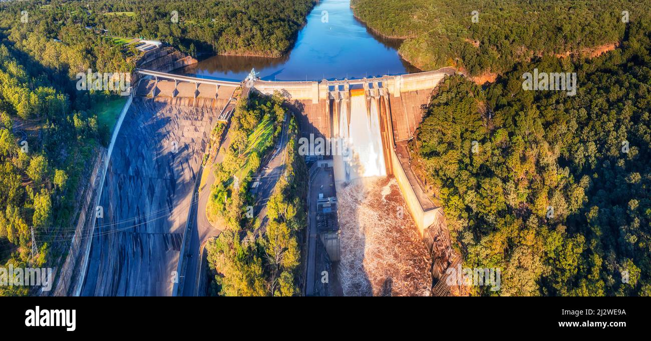 Overflowing dam on Warragamba river in Blue mountains – aerial no sky ...